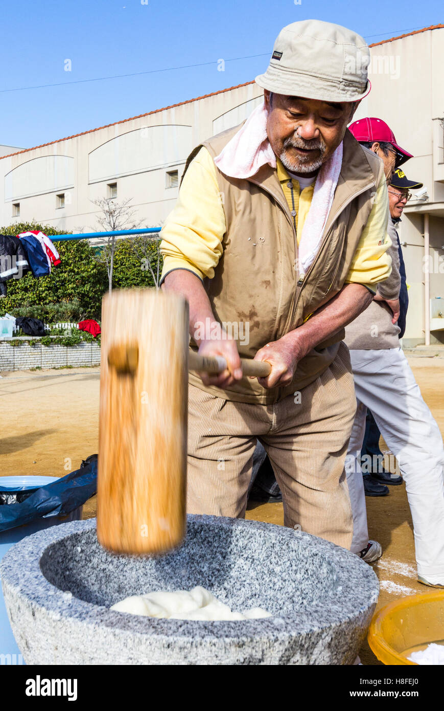 Pestle for pounding rice hi-res stock photography and images - Alamy