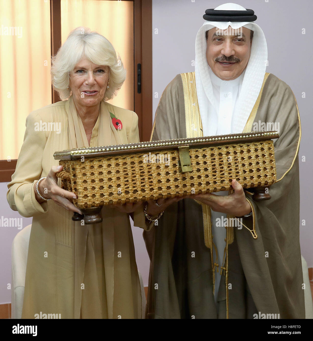 The Duchess of Cornwall is presented with a box of traditional items ...