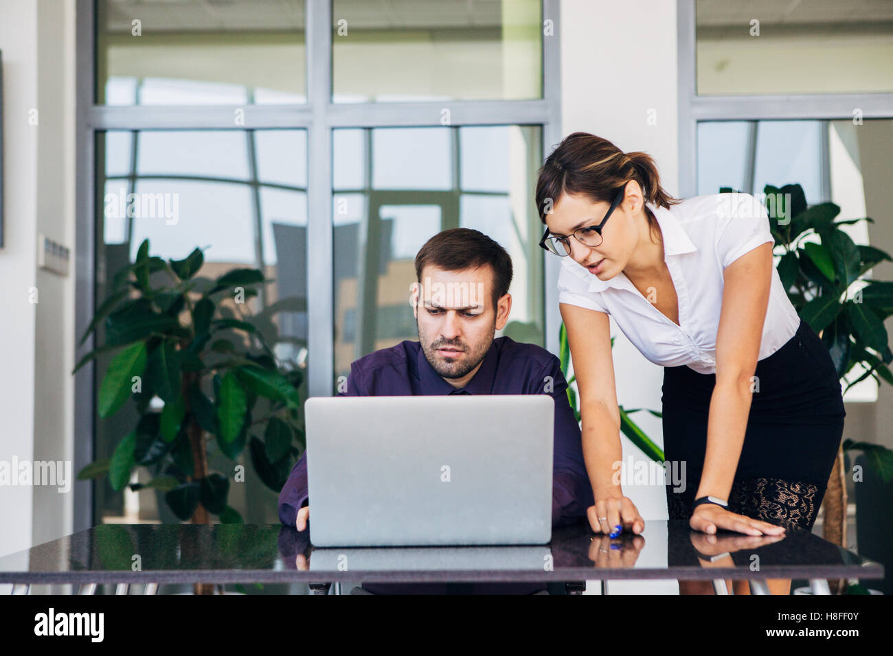 Office workers using computers Stock Photo - Alamy