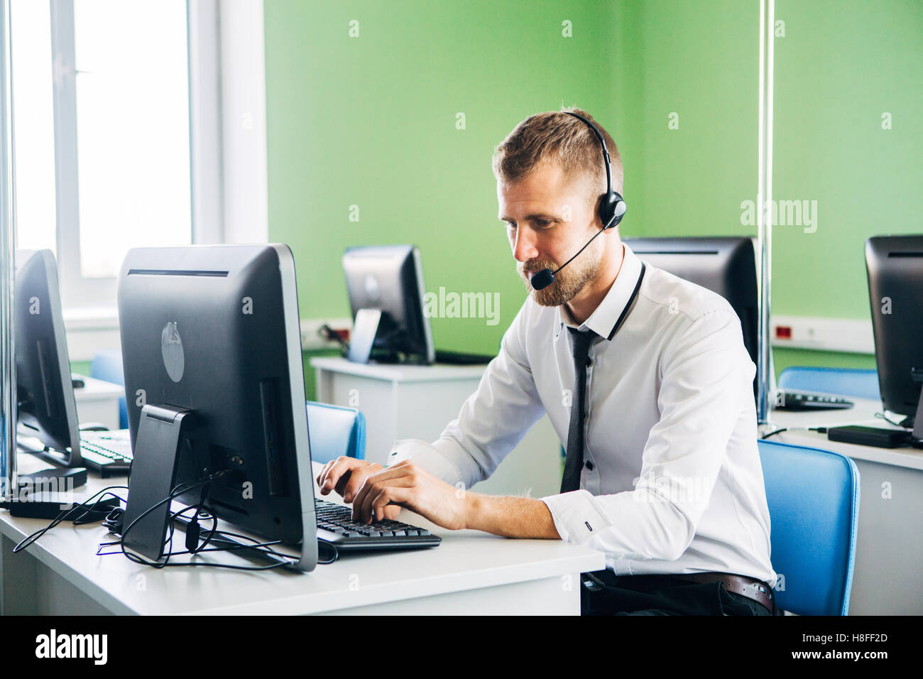 beautiful man working in call center Stock Photo - Alamy