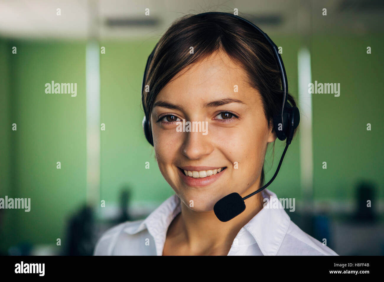 Woman smile receptionist portrait hi-res stock photography and images ...