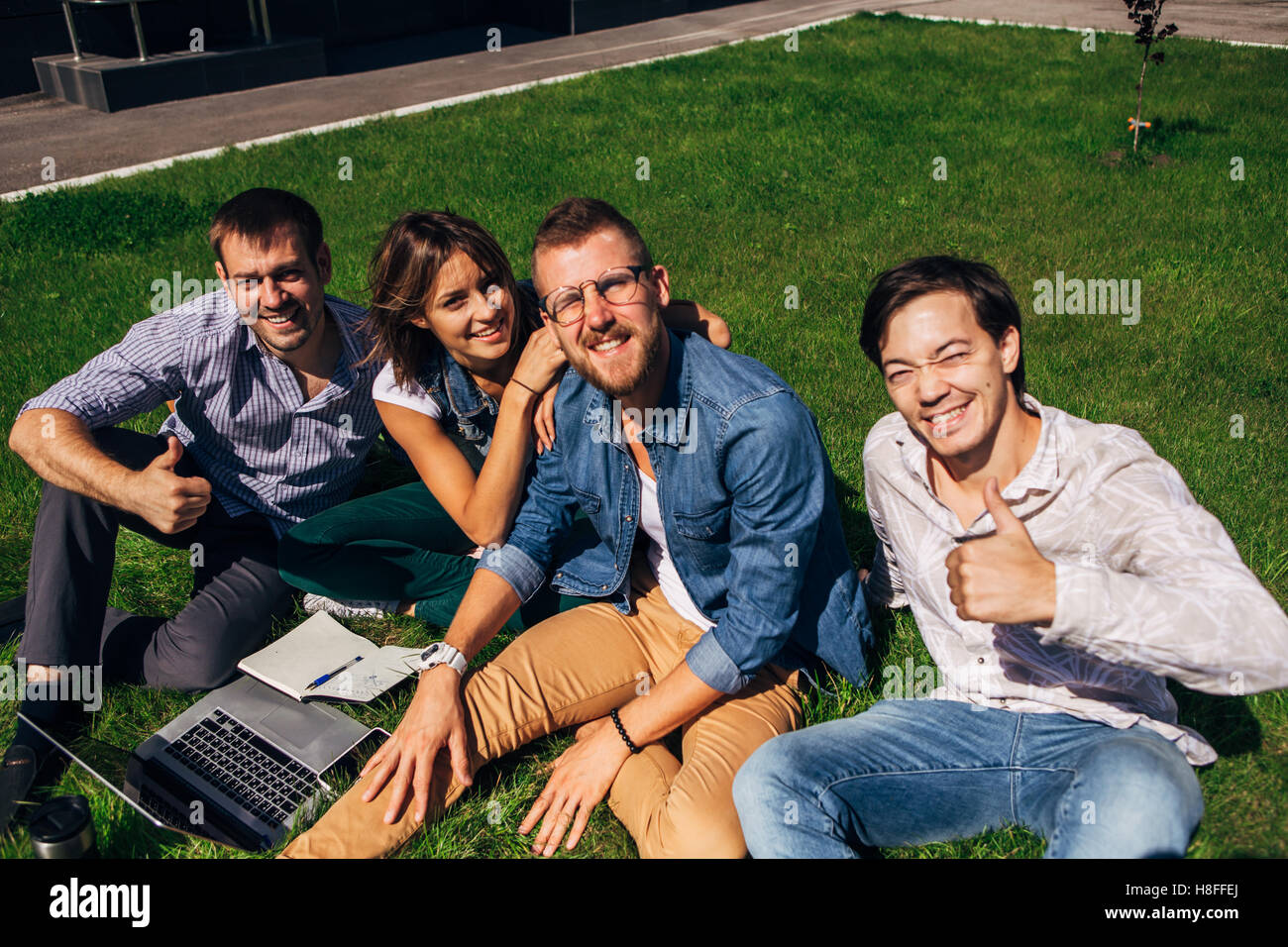 College girl on lawn with laptop hi-res stock photography and images ...