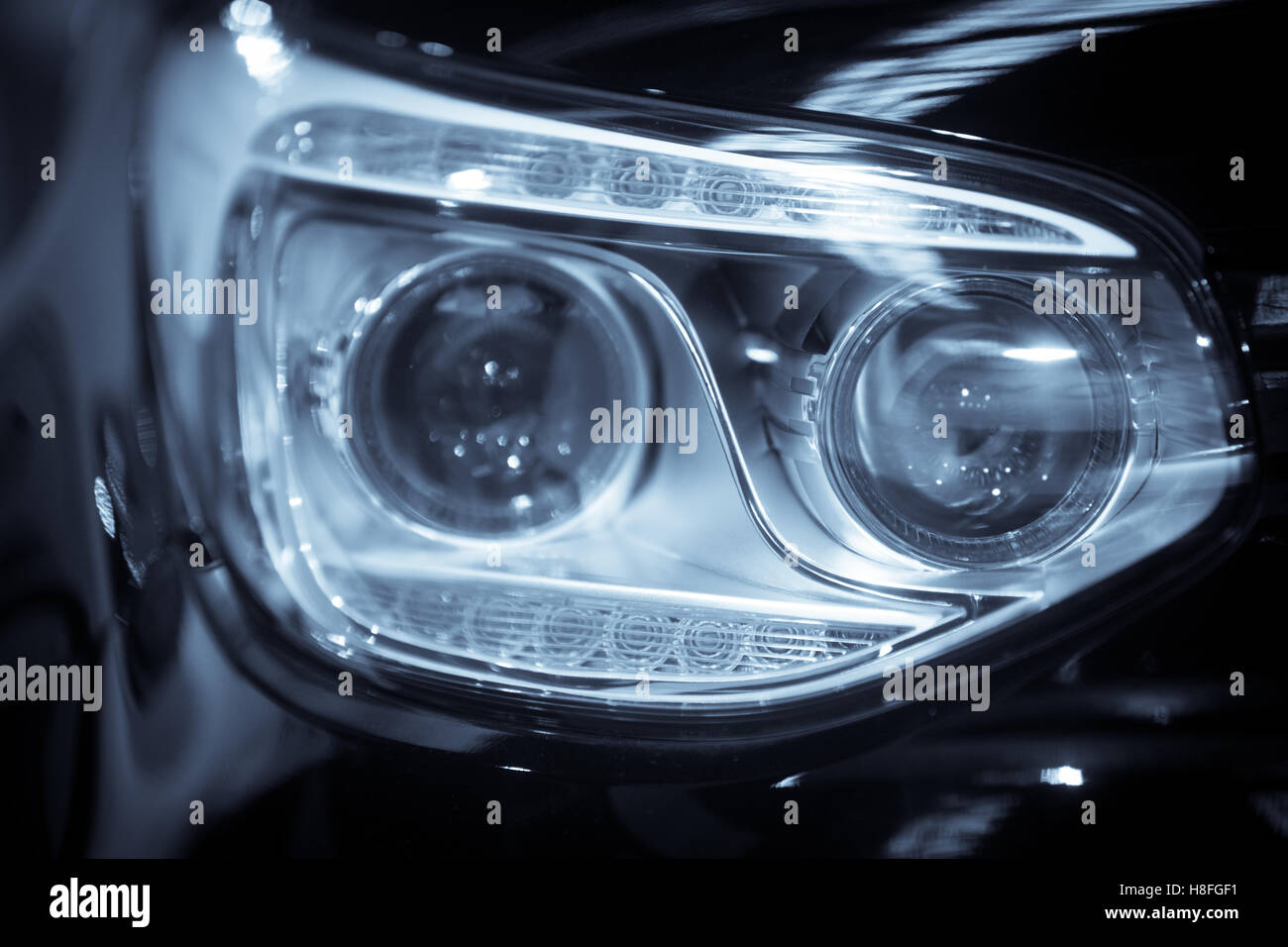Close up shot of a car's LED headlight Stock Photo - Alamy