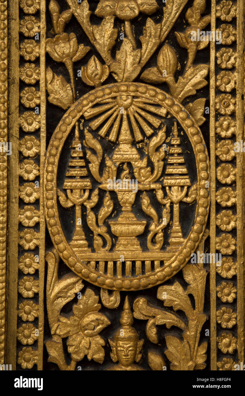 Gold decoration of traditional Cambodian design on a metal door at the ...