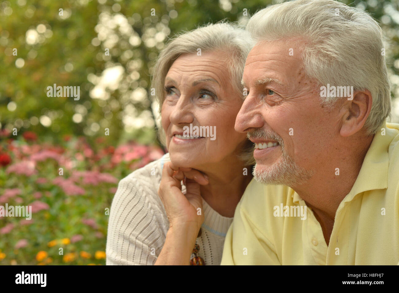 Mature couple in spring park Stock Photo - Alamy