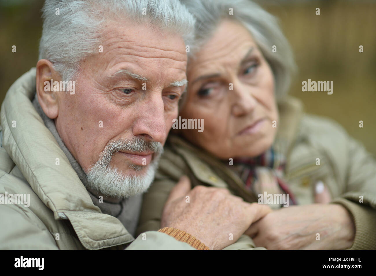 Thoughtful senior couple Stock Photo - Alamy