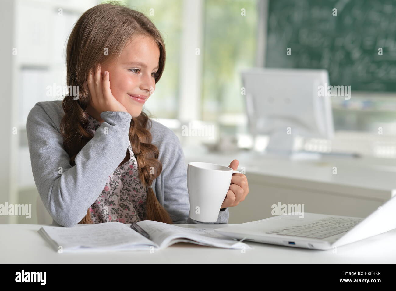 cute girl using laptop computer Stock Photo - Alamy