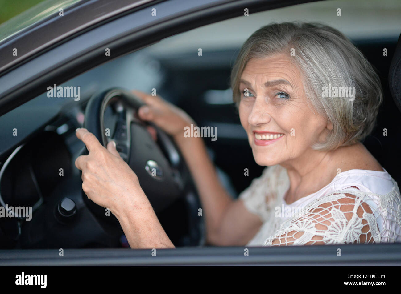 Senior Woman Driving Car Stock Photo - Alamy