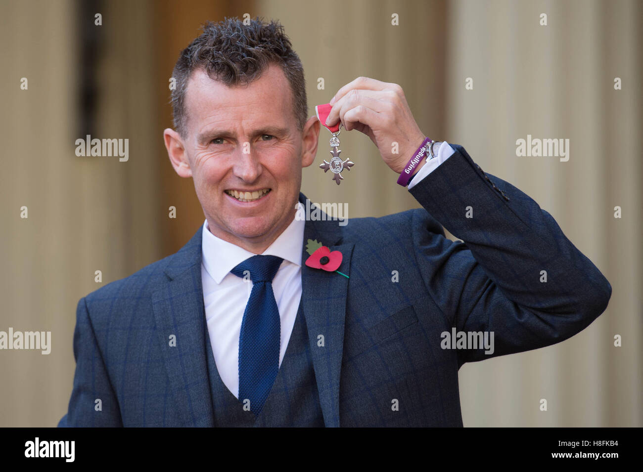 Rugby referee Nigel Owens with his MBE which he received from the Duke ...