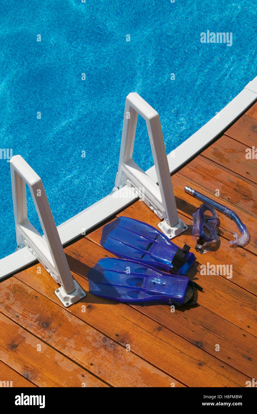 swimming gear at edge of pool Stock Photo - Alamy