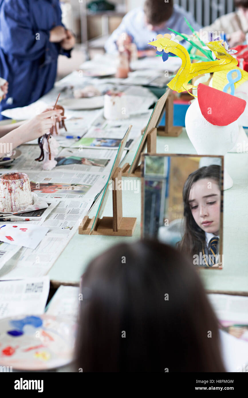 Girl painting during School arts class Stock Photo - Alamy