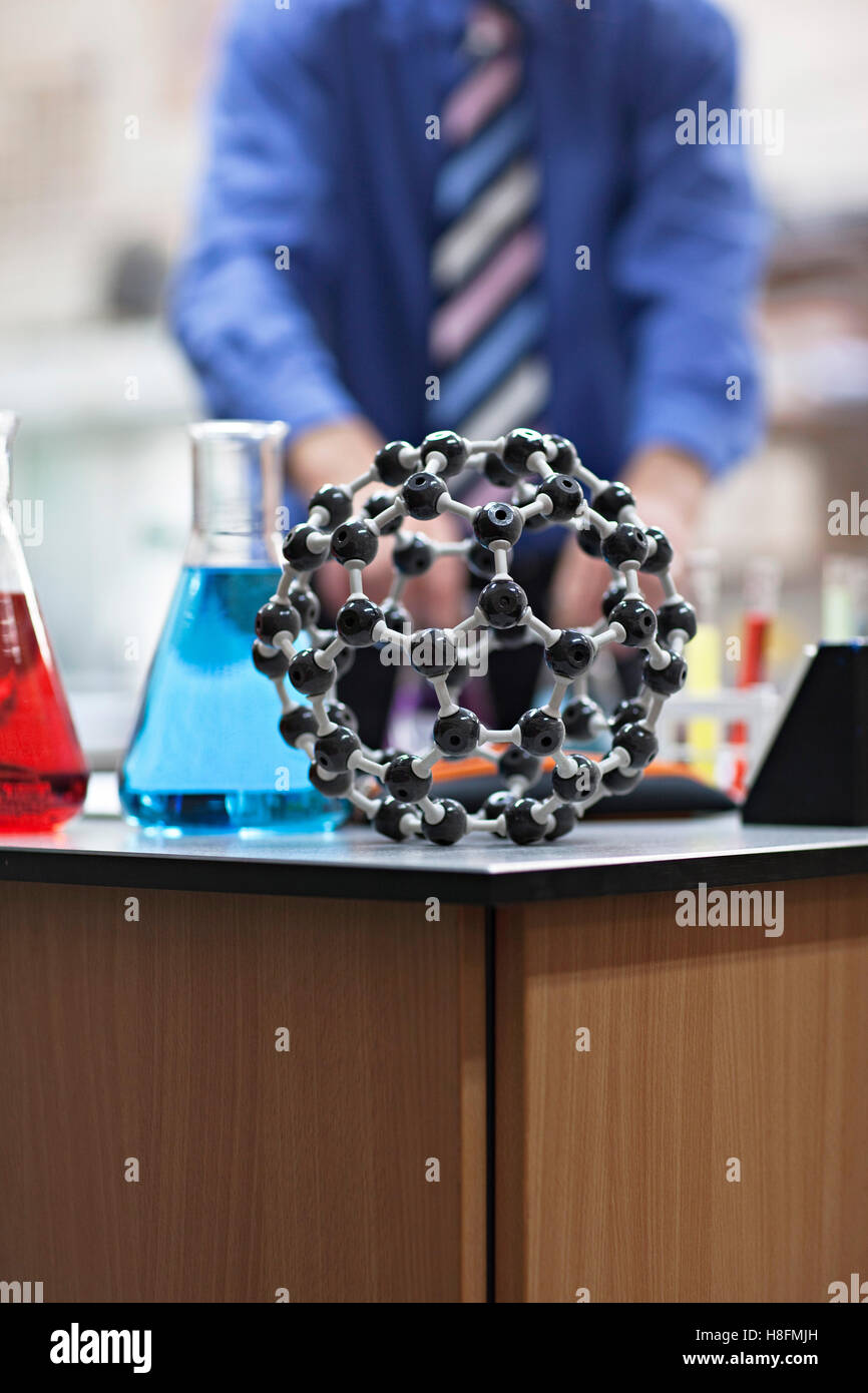 School science class. Teacher and molecular model. Portrait , Colour ...