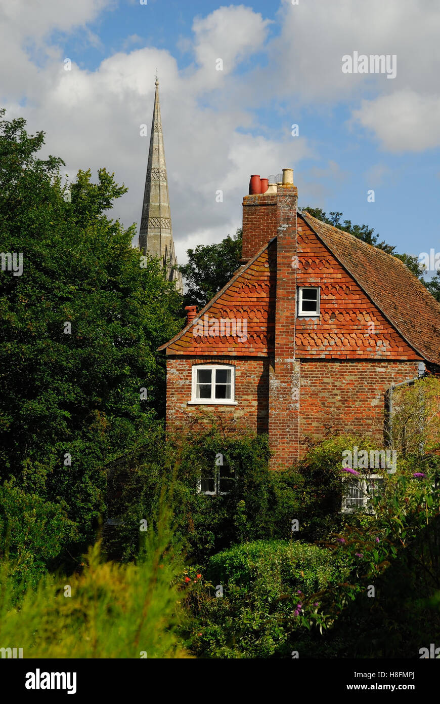 The spire of Salisbury cathedral is a distinctive landmark throughout ...
