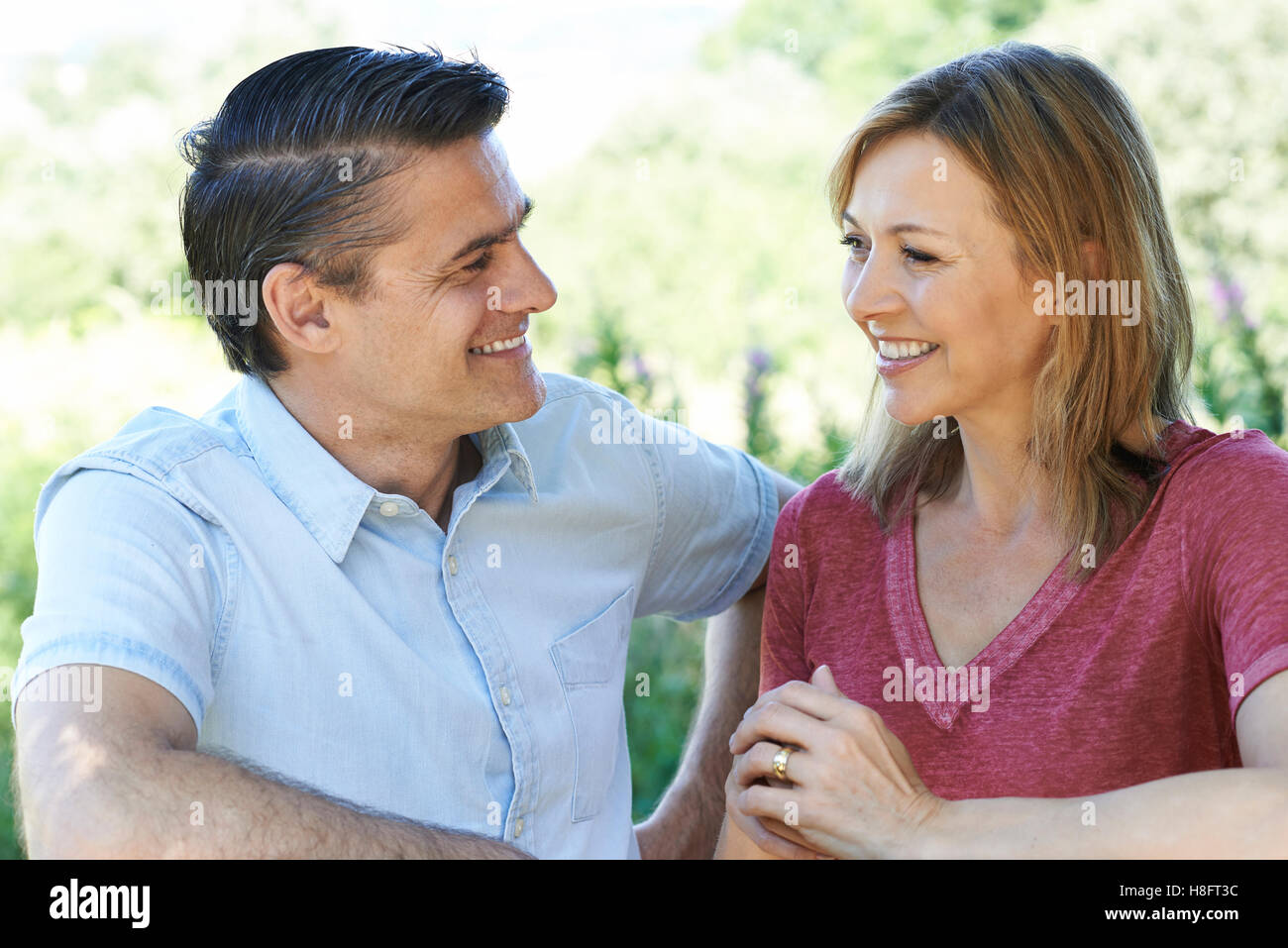 Two women one man talking hi-res stock photography and images - Alamy