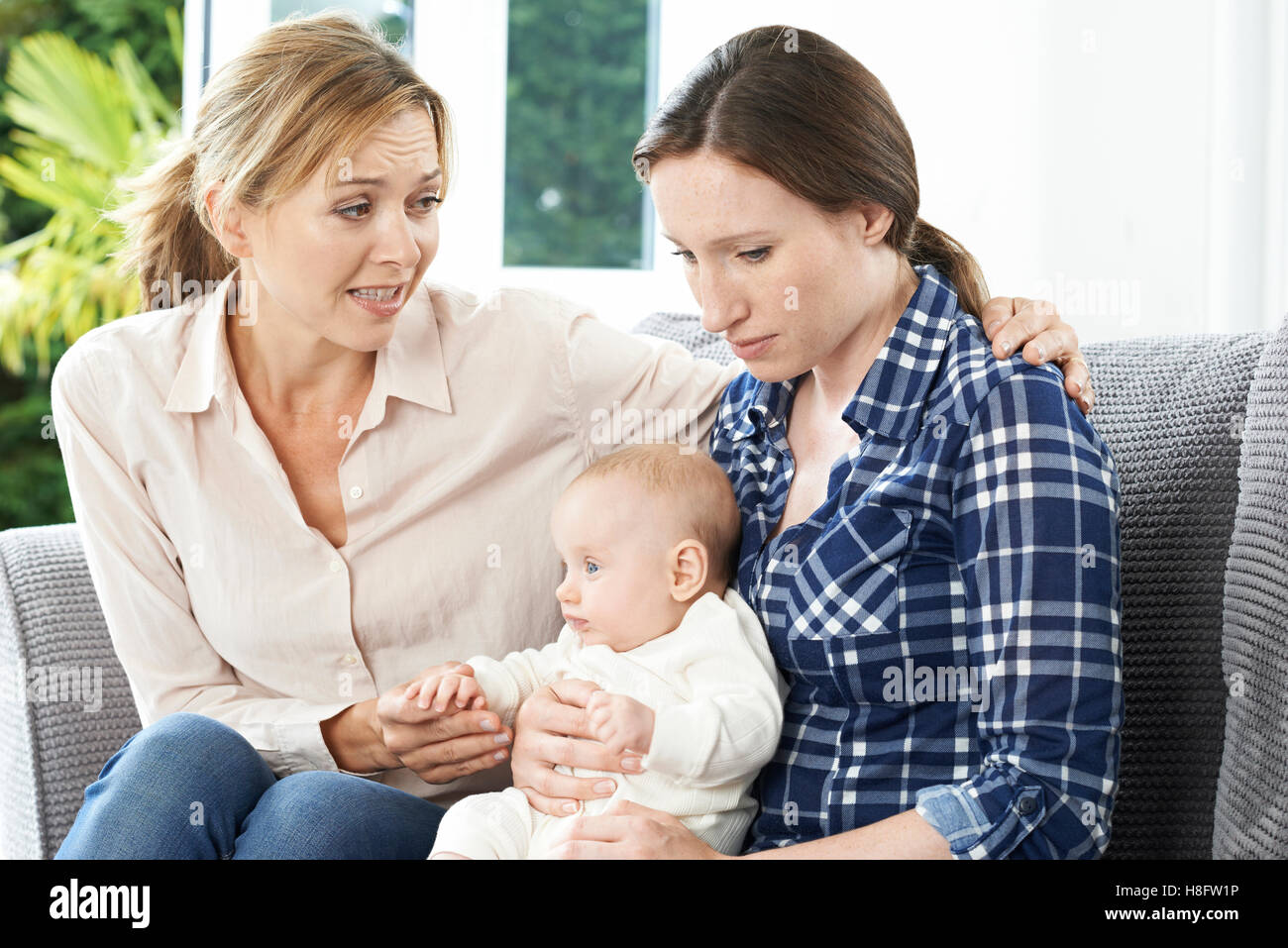 Adult daughter comforting her mother hi-res stock photography and images - Alamy