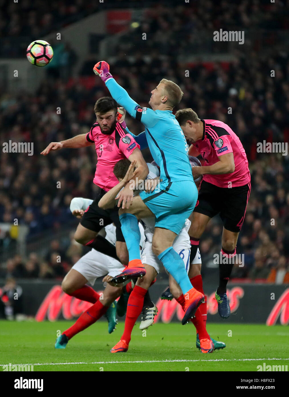 England Goalkeeper Joe Hart makes a save after an attempt on goal by ...