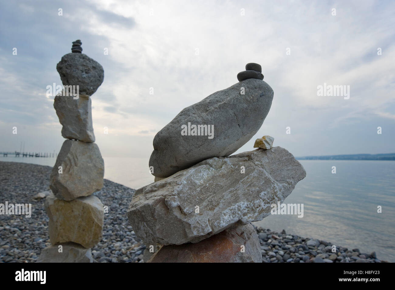Constance, little stone man at the lakeside Stock Photo - Alamy