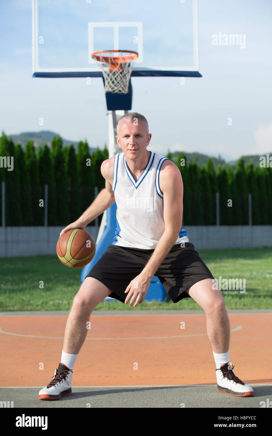 Caucasian man basketball street player hi-res stock photography and ...