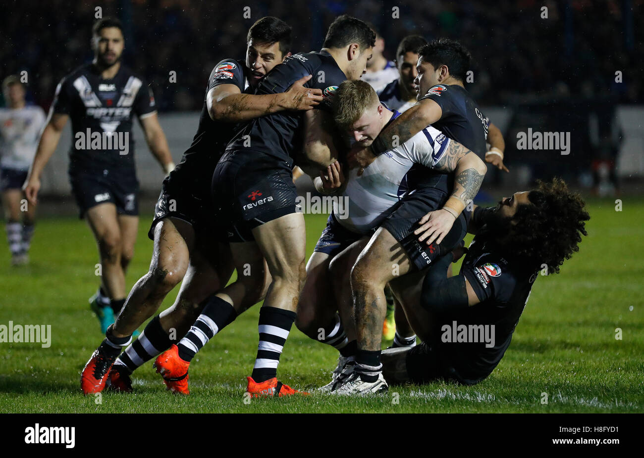 Scotland's Danny Addy is held up at the line by New Zealand during the ...