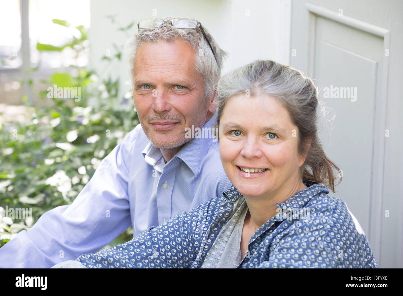 Married couple, portrait, looking into camera Stock Photo - Alamy