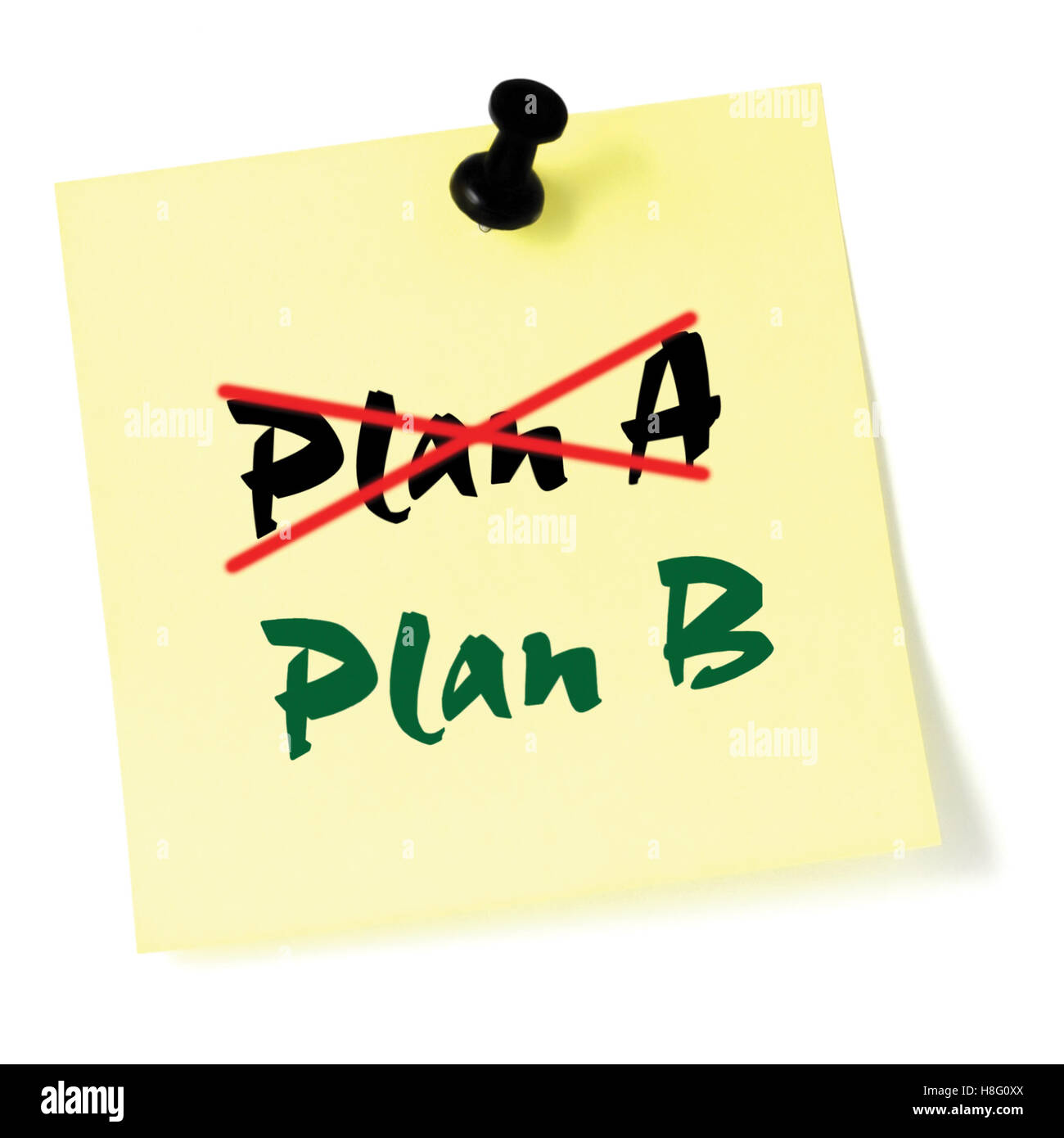 Crossing out Plan A, writing Plan B, Yellow Post-It Style Sticky Note ...