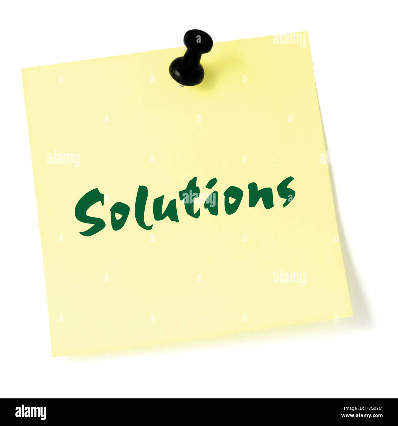 Solutions, written on a sticky adhesive note, isolated yellow post-it ...