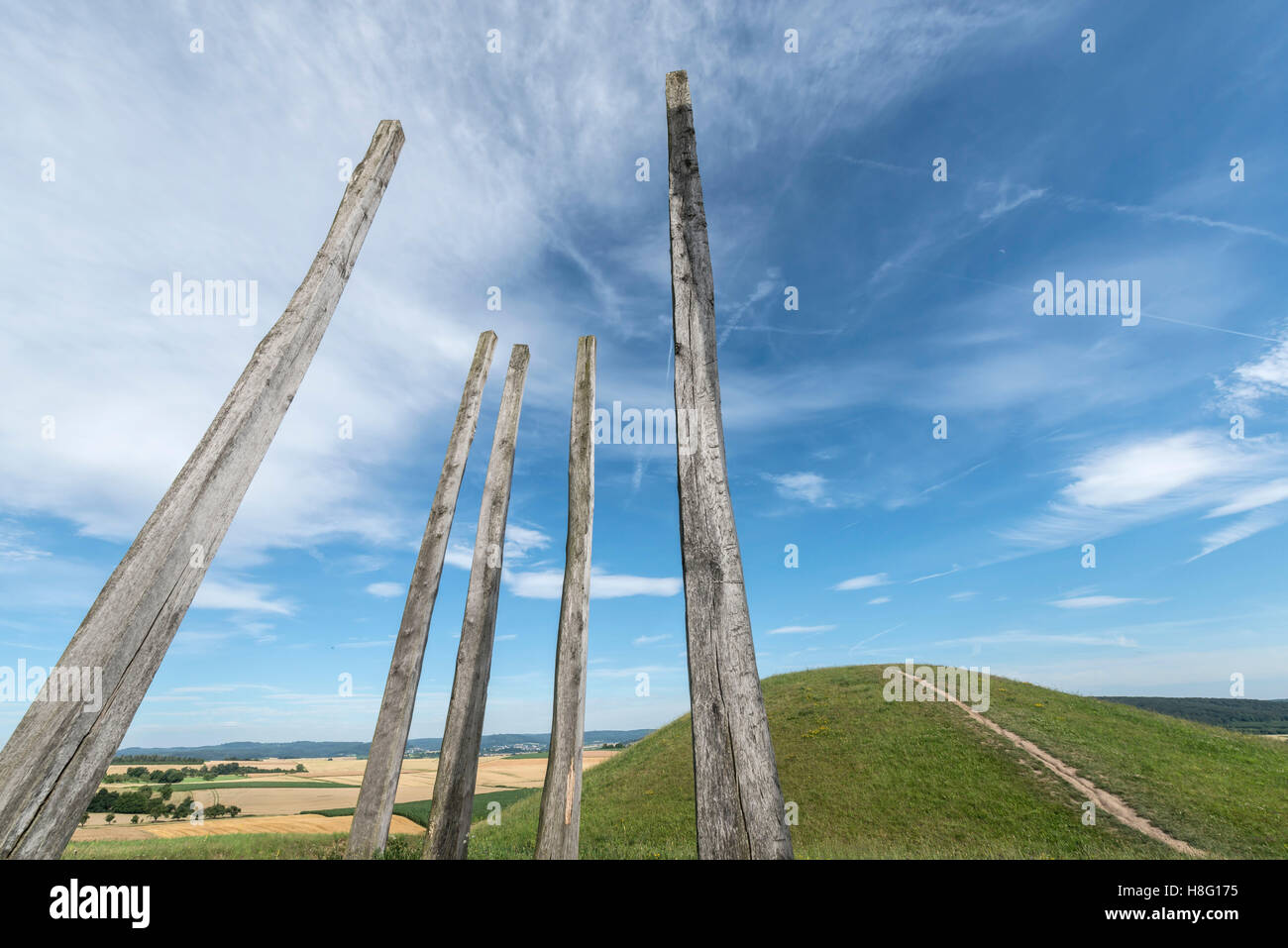 Glauburg, Hessia, Germany, tumulus and wooden posts of the 'Keltenwelt ...
