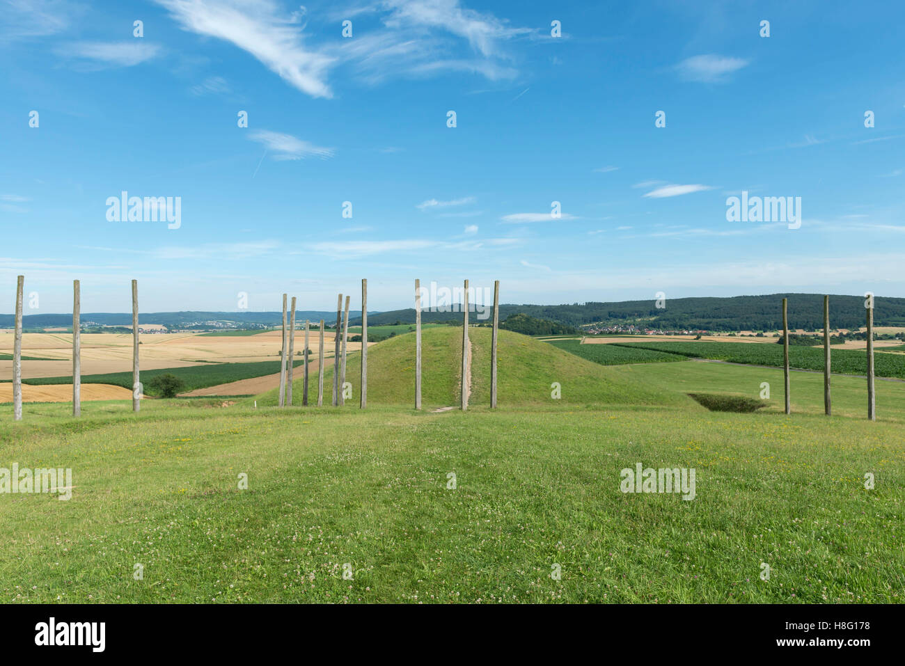 Glauburg, Hessia, Germany, tumulus and wooden posts of the 'Keltenwelt ...