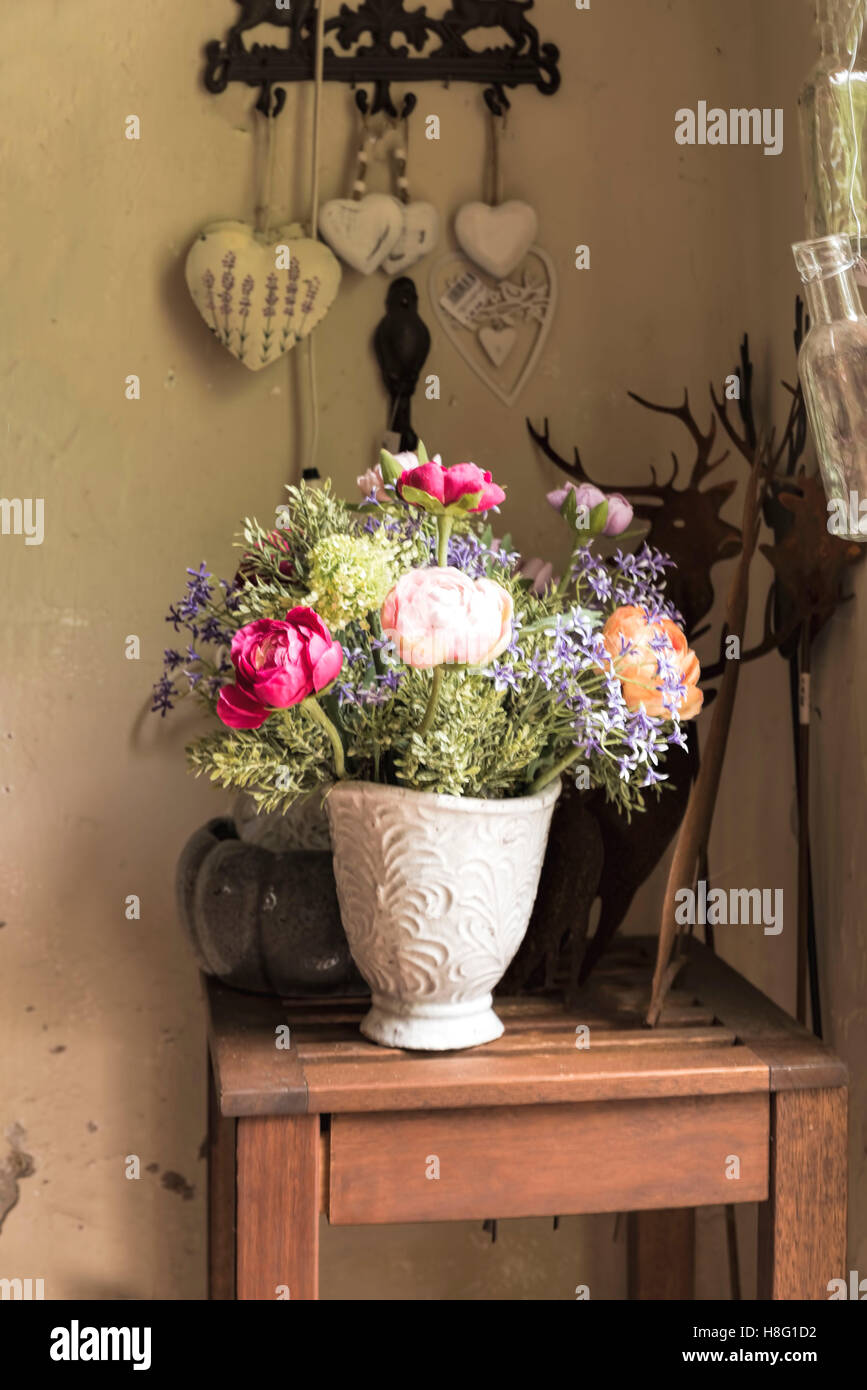 Side table, flowers, vase Stock Photo - Alamy
