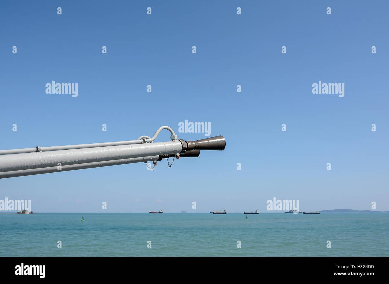 Army gun on the boat with sea and sky background,close up on gun Stock ...
