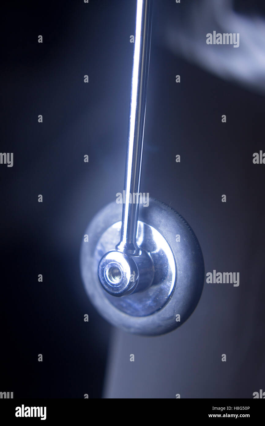 Doctor's reflex hammer tool used to test patient reflexes in knee and ...