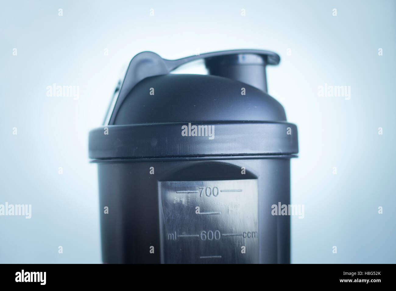 Protein shake shaker used to mix whey powder, glutamine, creatine and ...