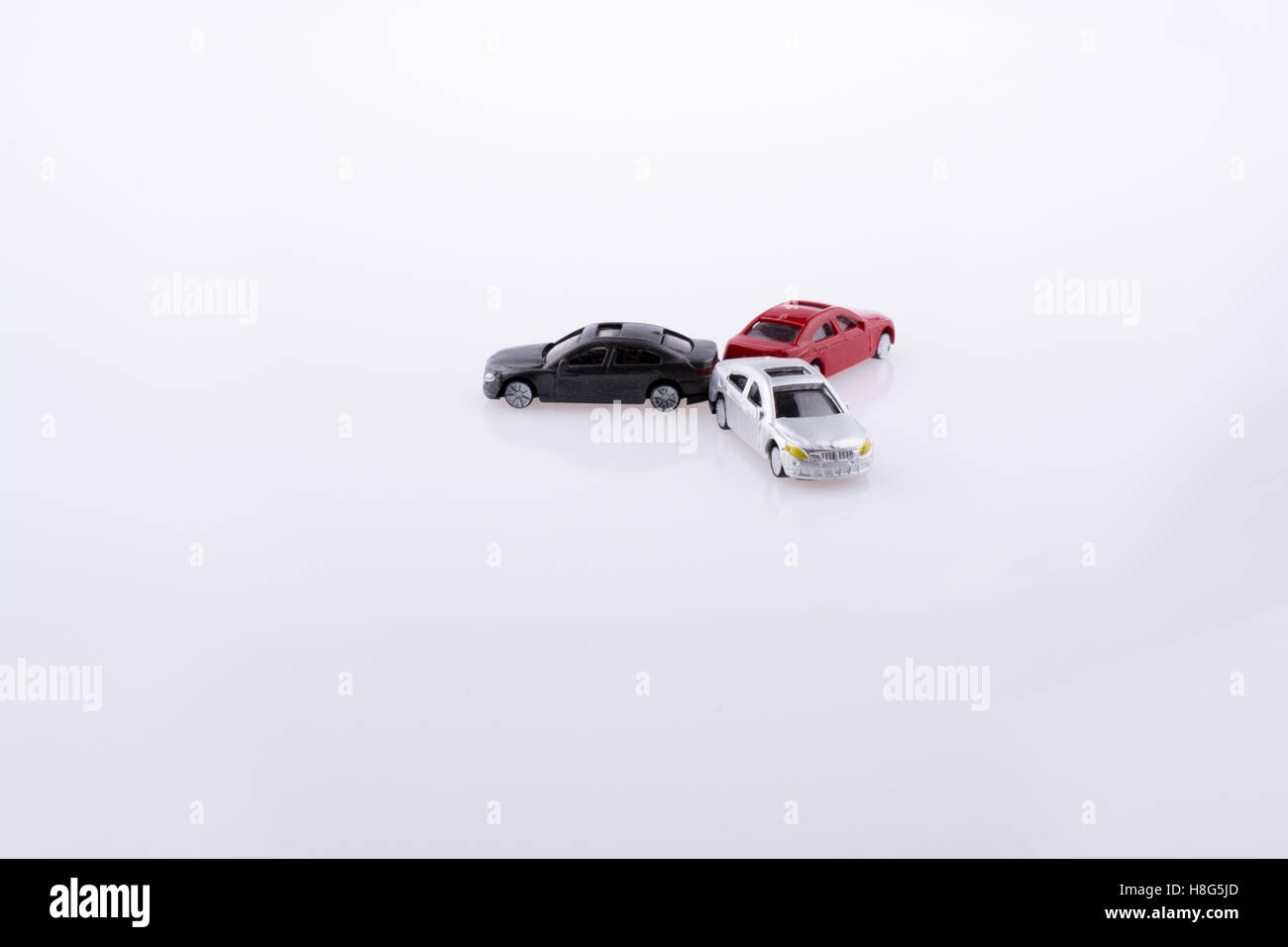 Colorful little toy cars on white background Stock Photo - Alamy