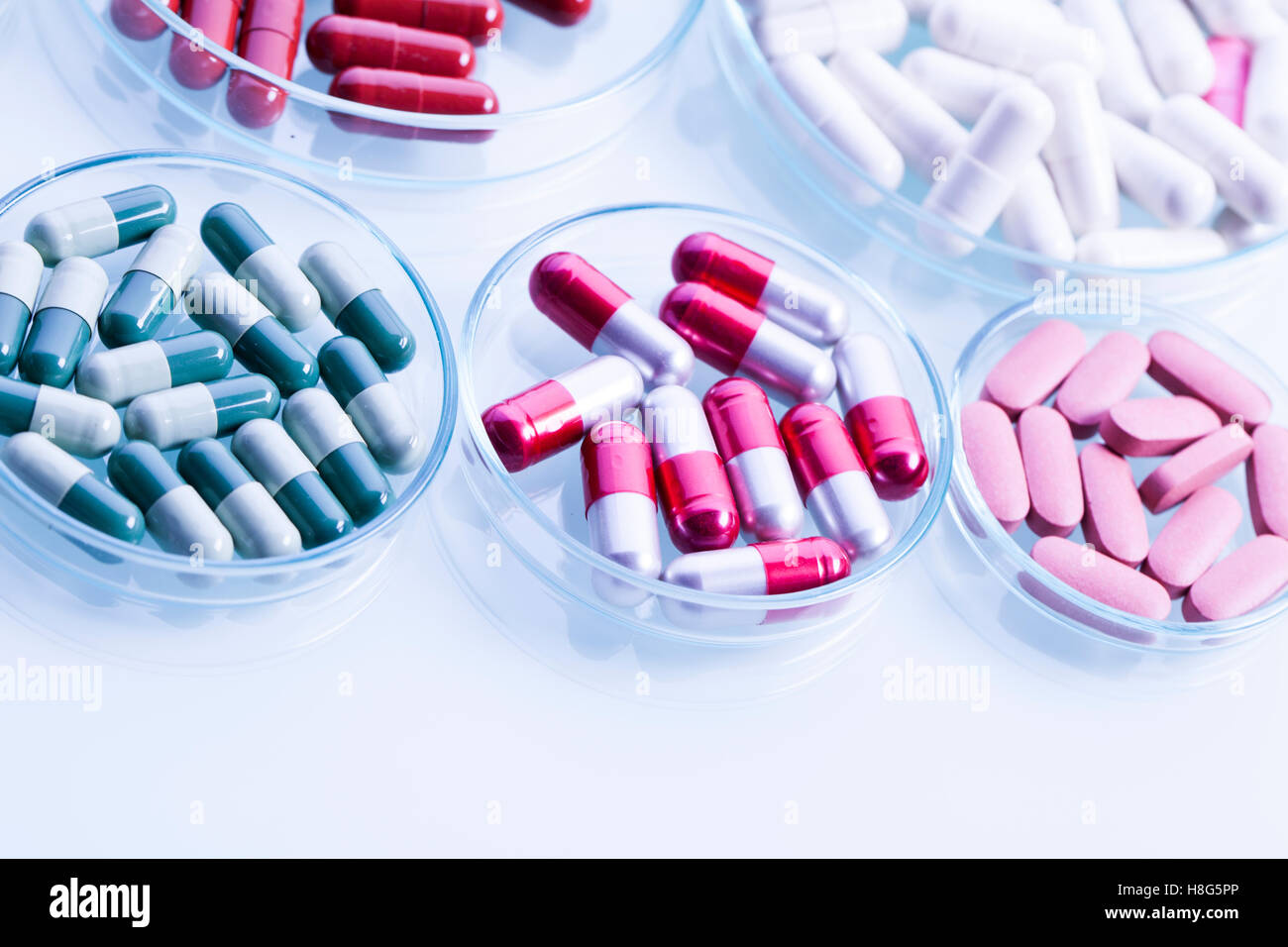 Set of capsules on white background. Studio Shot Stock Photo - Alamy