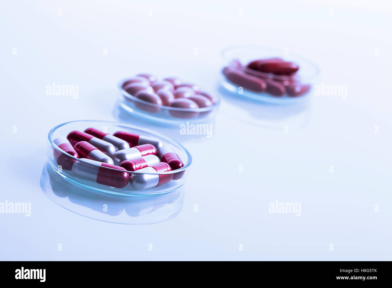 Set of capsules on white background. Studio Shot Stock Photo - Alamy