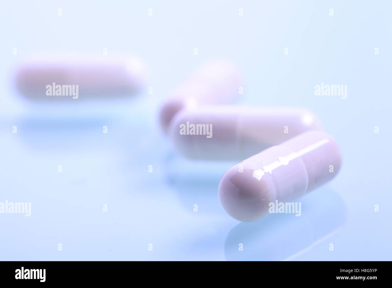 Set of capsules on white background. Studio Shot Stock Photo - Alamy