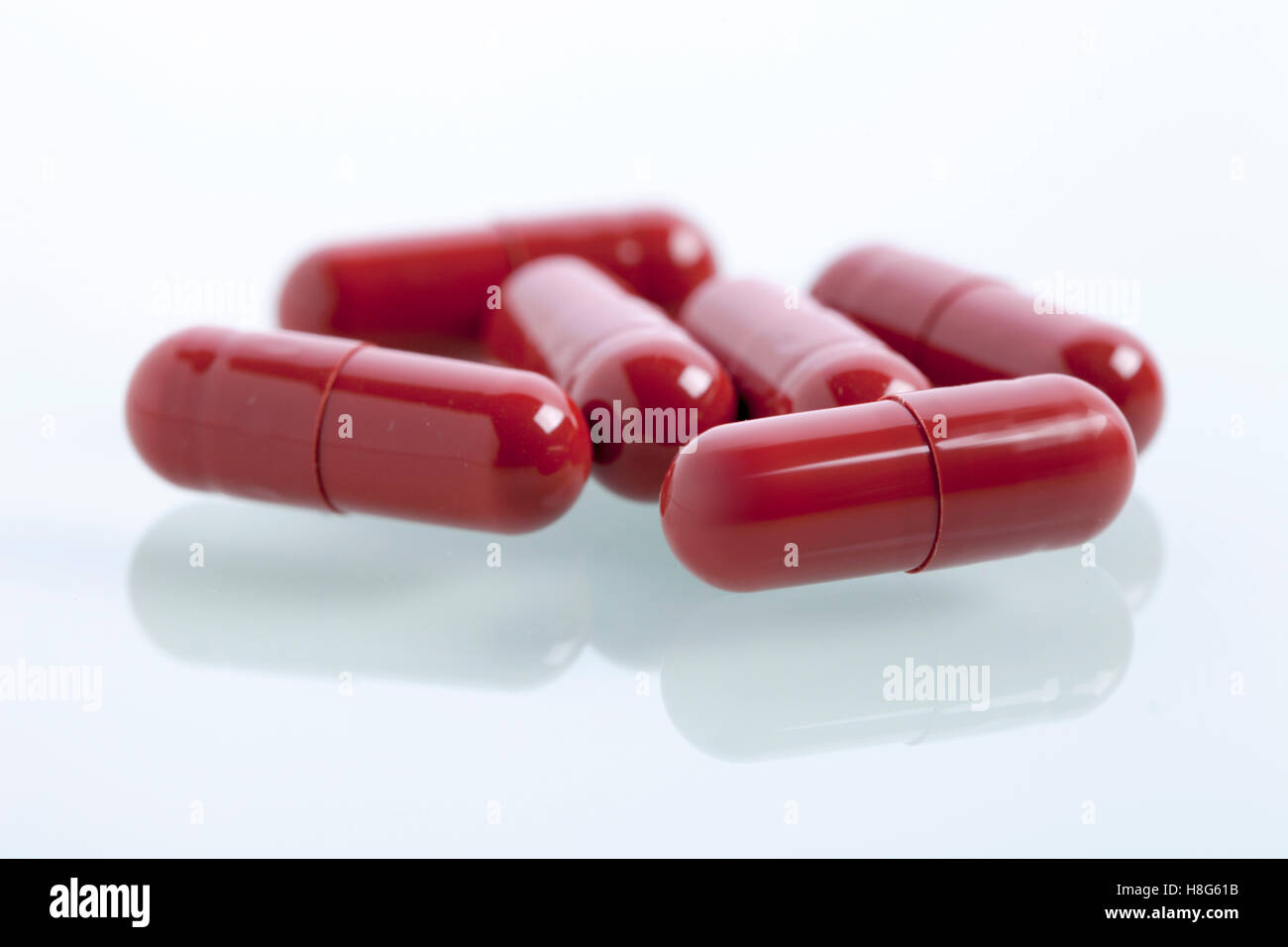 Set of capsules on white background. Studio Shot Stock Photo - Alamy