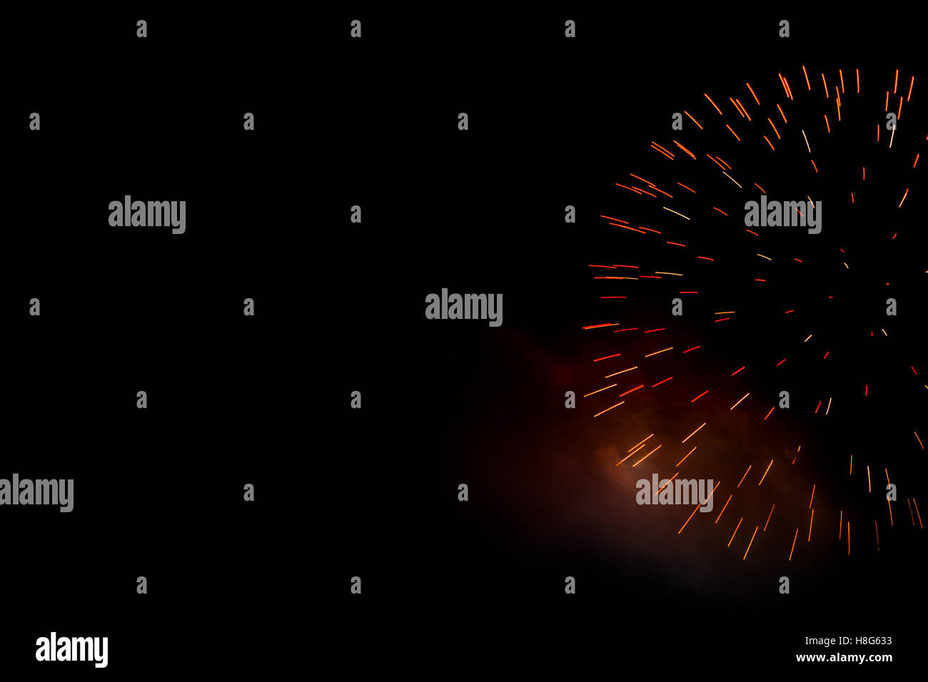Festive colour firework background at a dark night Stock Photo - Alamy