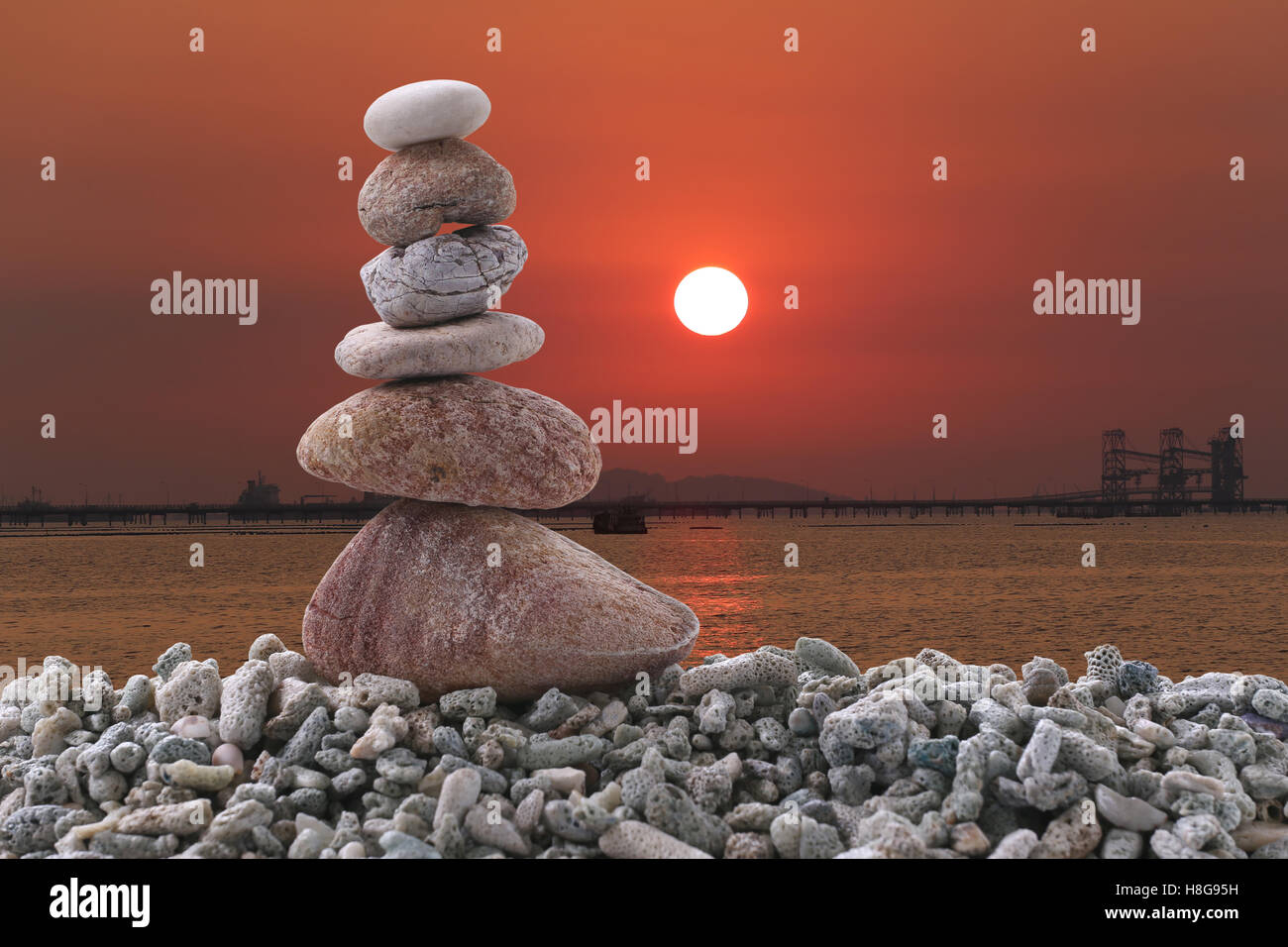 Balance stone on pile rock of sunset background in the evening,concept ...