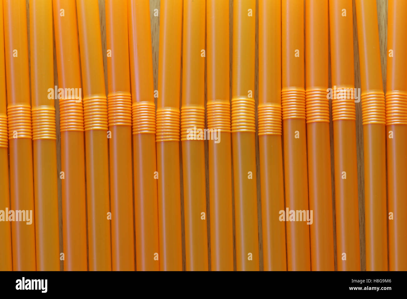 Drink tube of Orange color in abstract background for the design idea ...