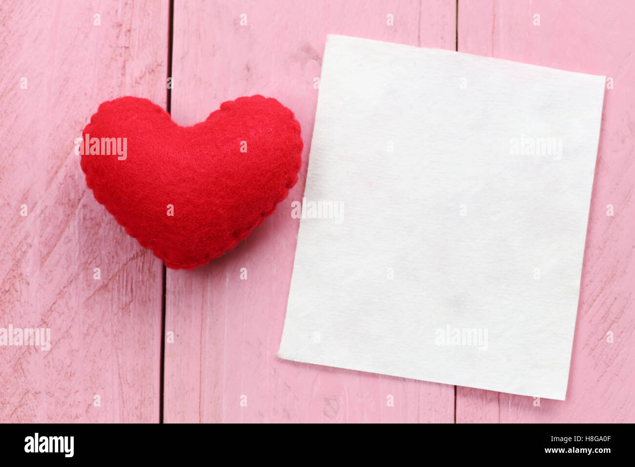 Red heart placed on paper note of empty for input text or message in ...