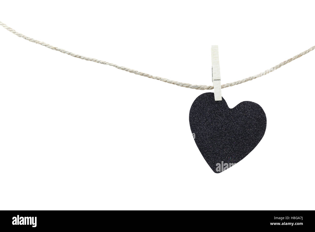 Black Heart hung on hemp rope isolated on white background and have ...