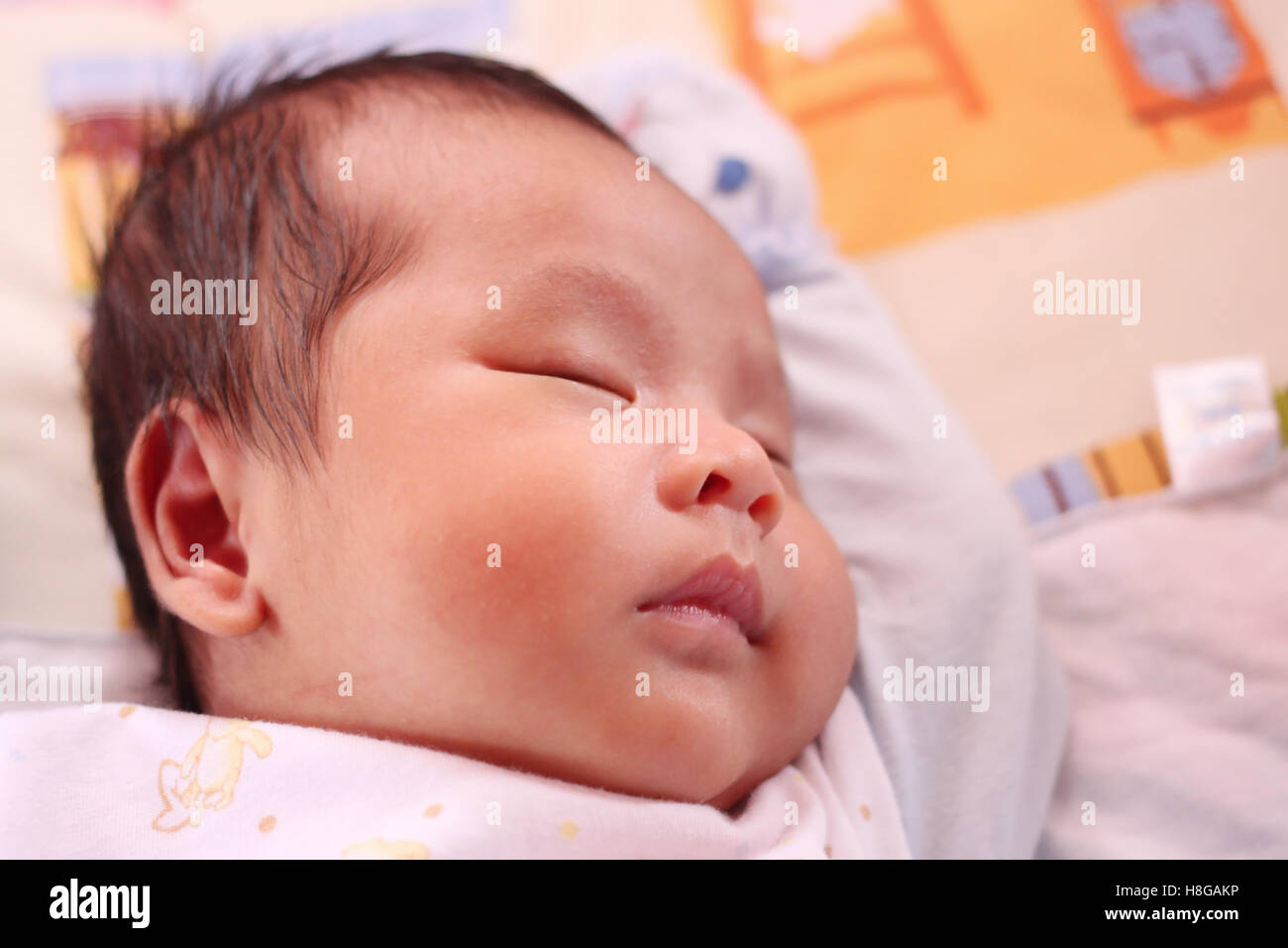 Closeup Asian baby is sleeping on the bed,concept of health and growth ...
