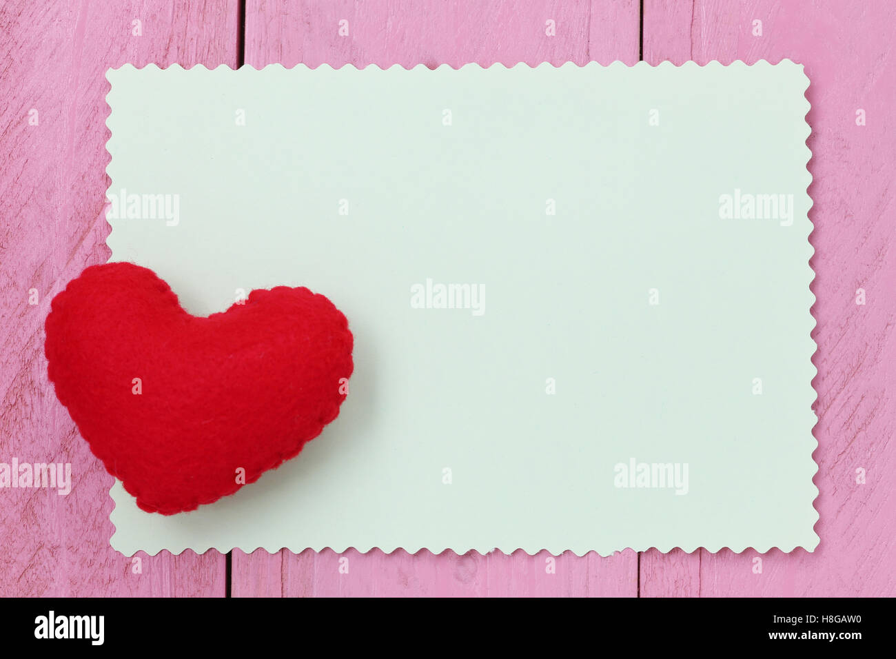 Red heart placed on paper note of empty for input text or message in ...