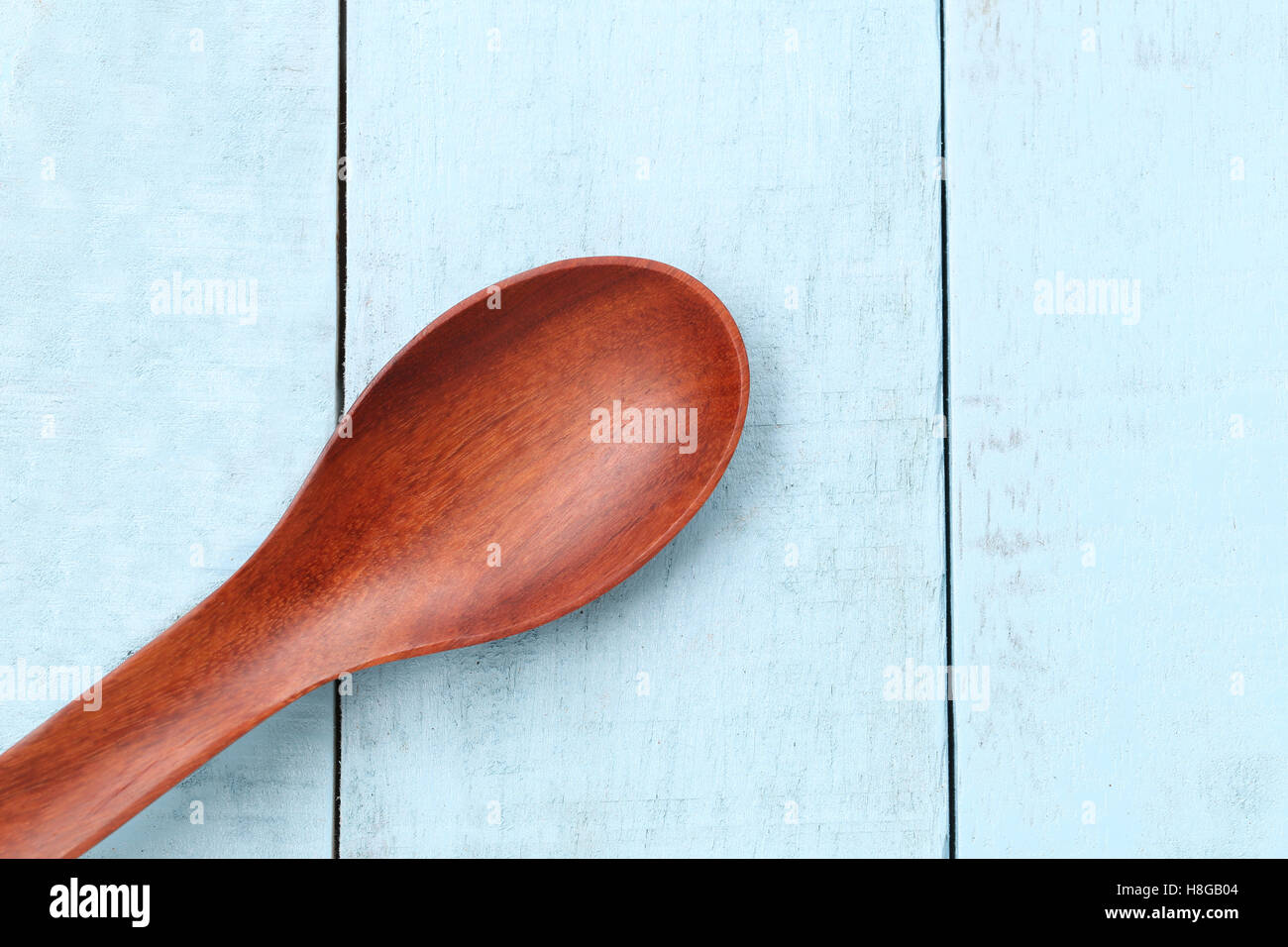 Wooden spoon on blue wood floors,concept of utensils and cooking Stock ...