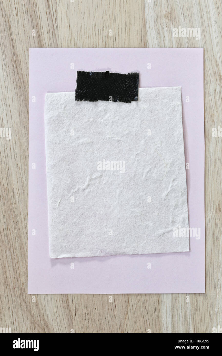 Pink notepad paper of empty and copy space on wooden background,You can ...