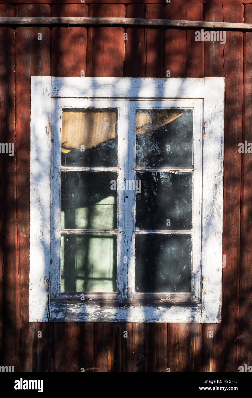 Traditional Swedish barn window with white wooden frames Stock Photo ...