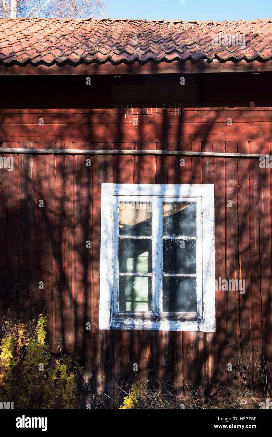 Traditional Swedish barn window with white wooden frames Stock Photo ...