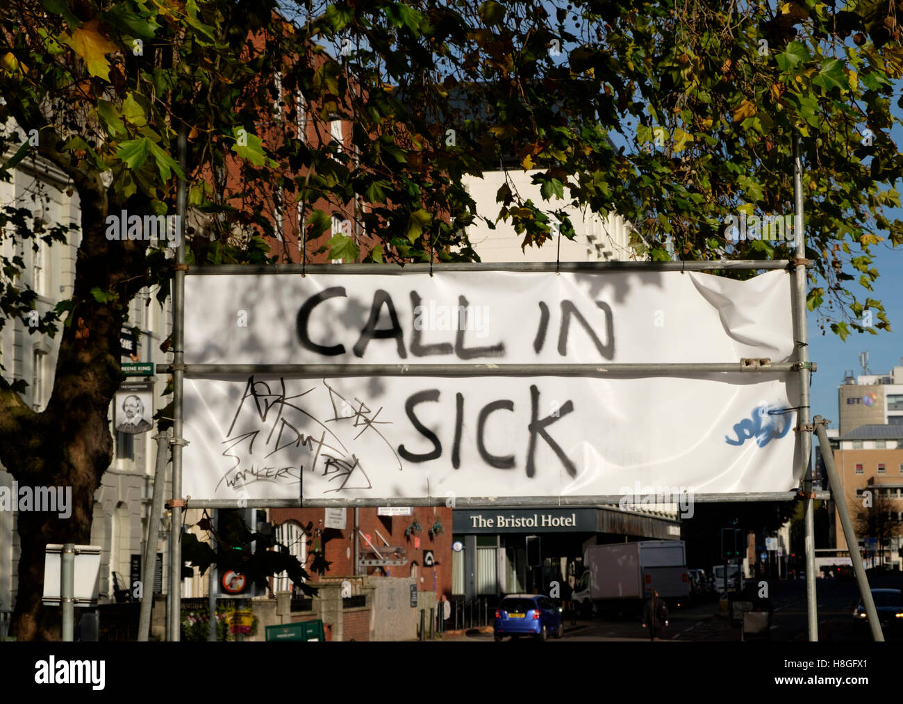 Call in sick graffiti in Bristol Stock Photo - Alamy