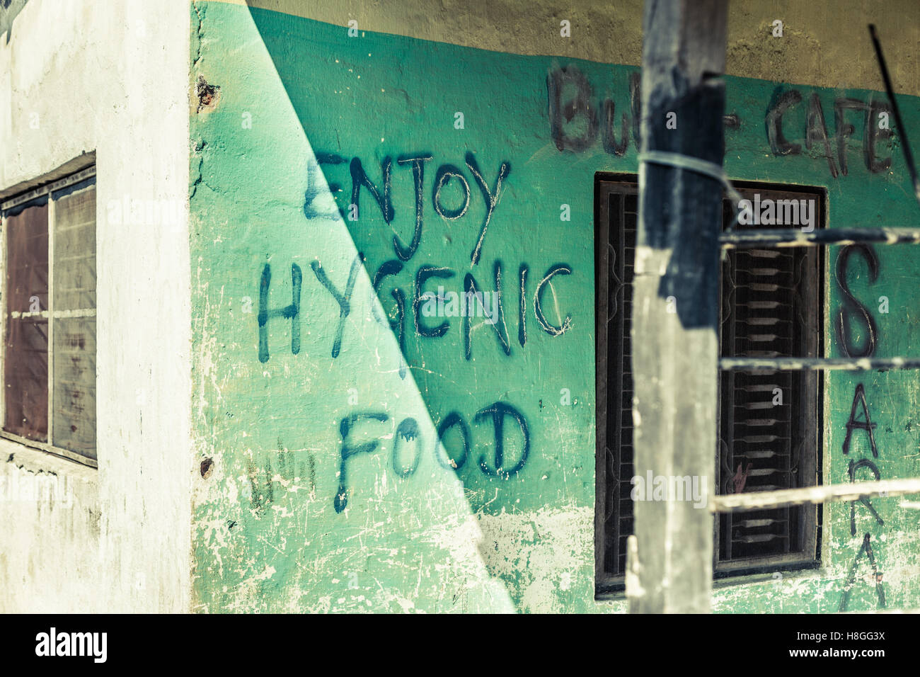 Enjoy hygenic food graffiti on the wall Stock Photo - Alamy